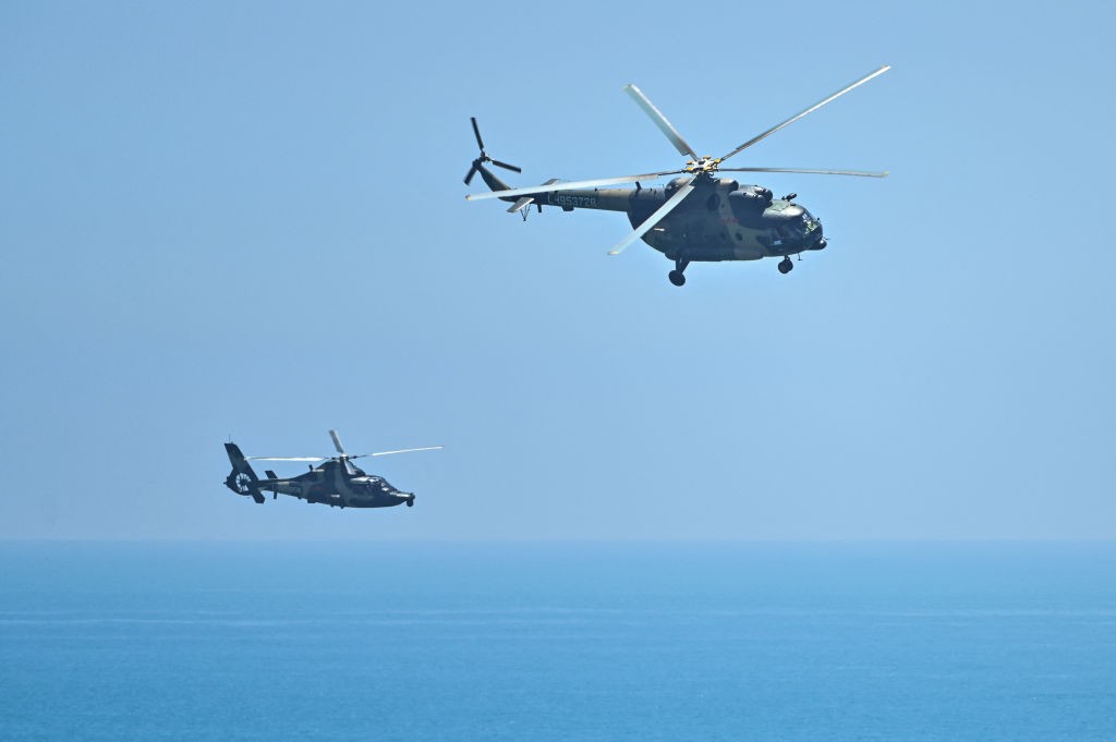 China flexes its military muscle China flexes its military muscle