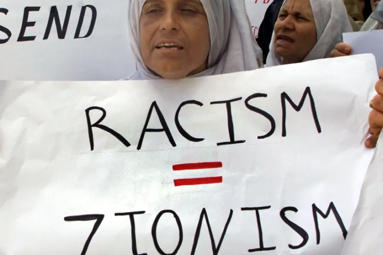 RACISM = ZIONISM RACISM = ZIONISM